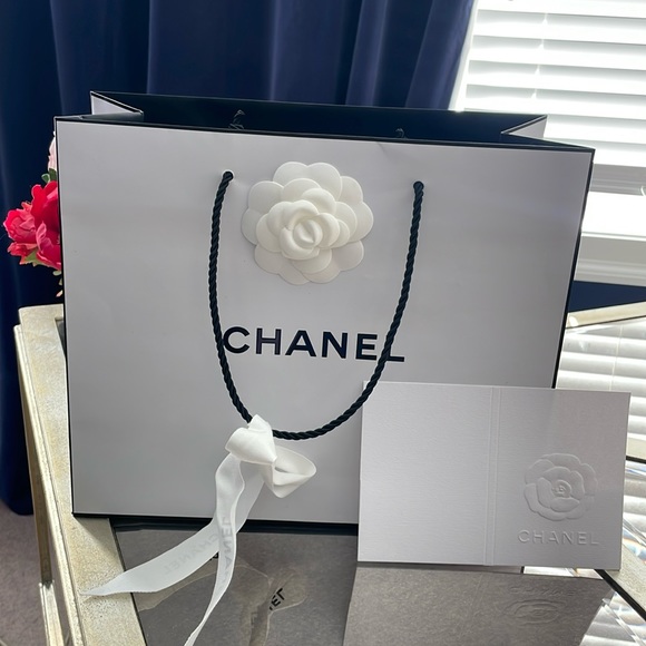 CHANEL | Other | Chanel Gift Bag With Ribbon And Receipt Carrier | Poshmark